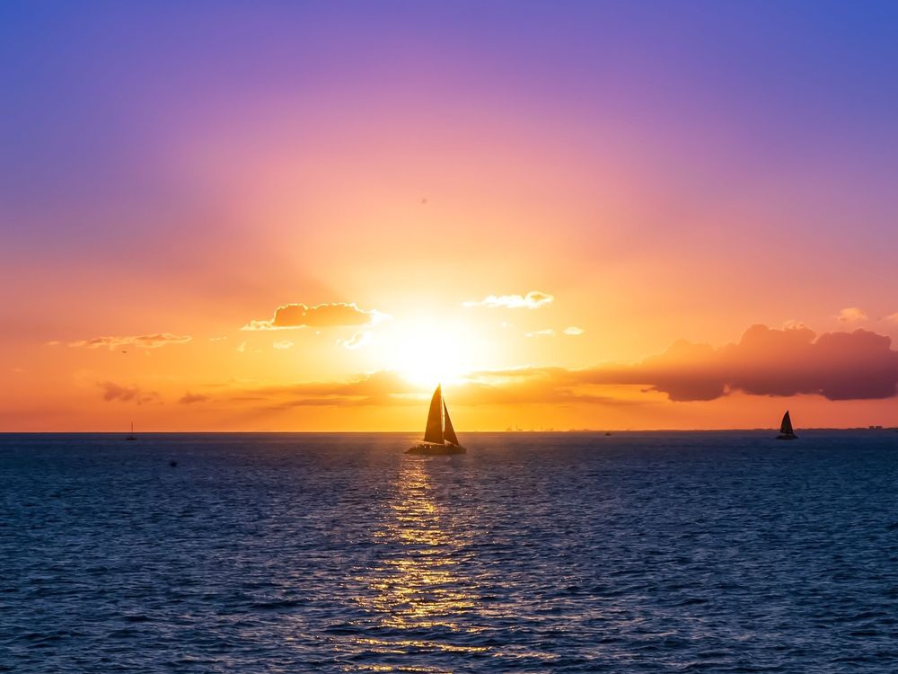 Waikiki Sunset Open-Bar Party Cruise from Kewalo Harbor - Na Hoku 2 ...